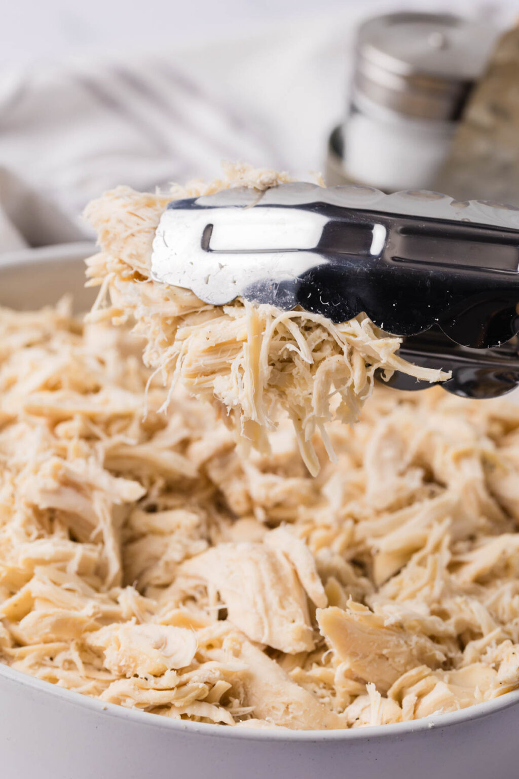 Slow Cooker Shredded Chicken - easydinnerrecipes.com
